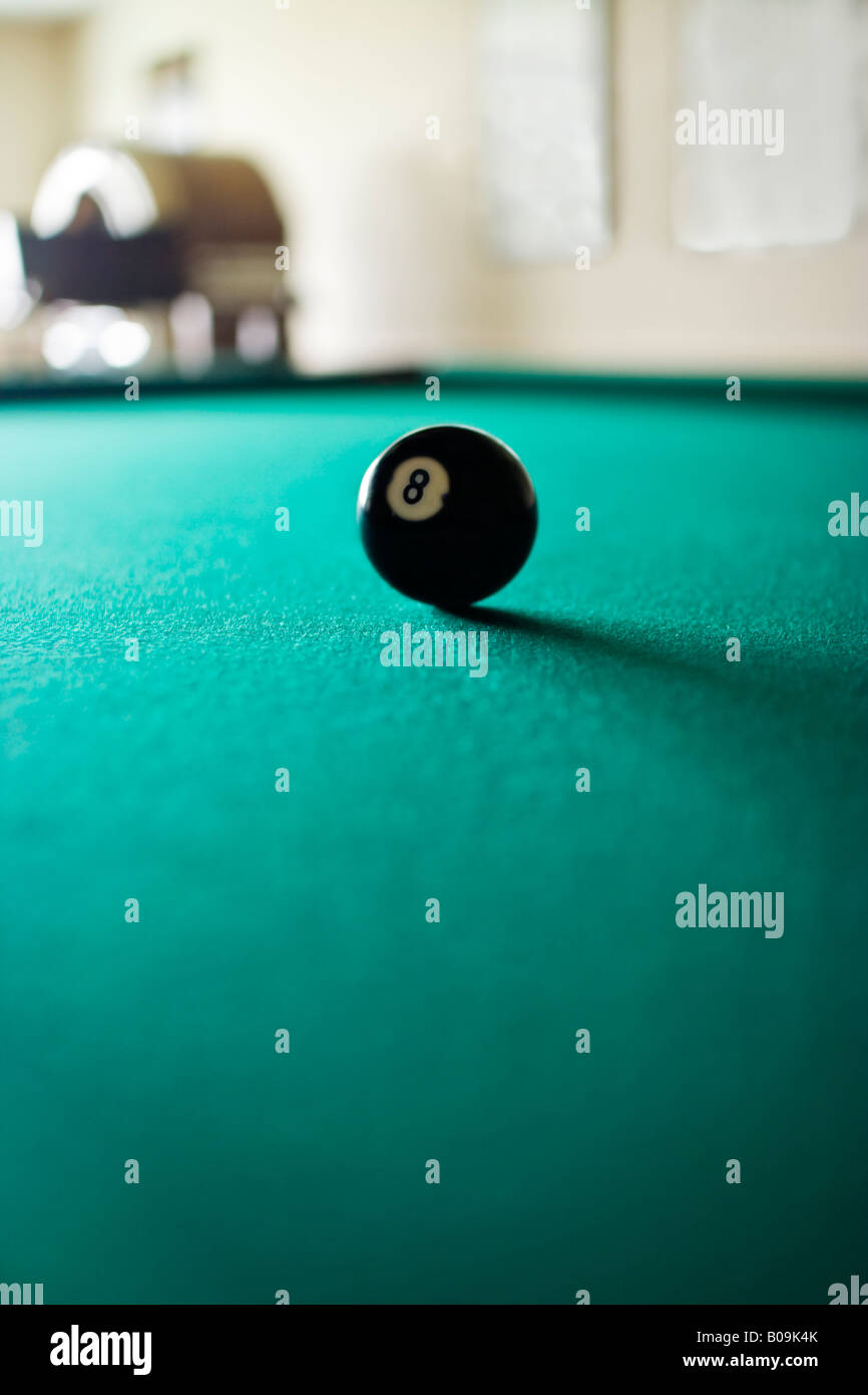 Eight ball on pool table Stock Photo - Alamy