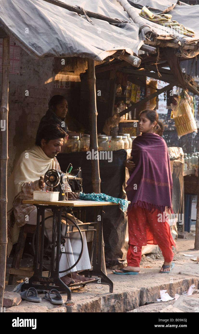 Mend clothes man hi-res stock photography and images - Alamy