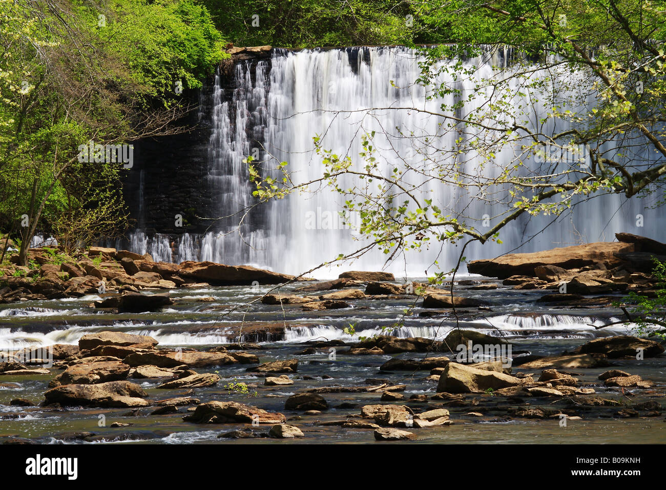 Water pours over the old historic, antebellum Roswell Mill dam located ...