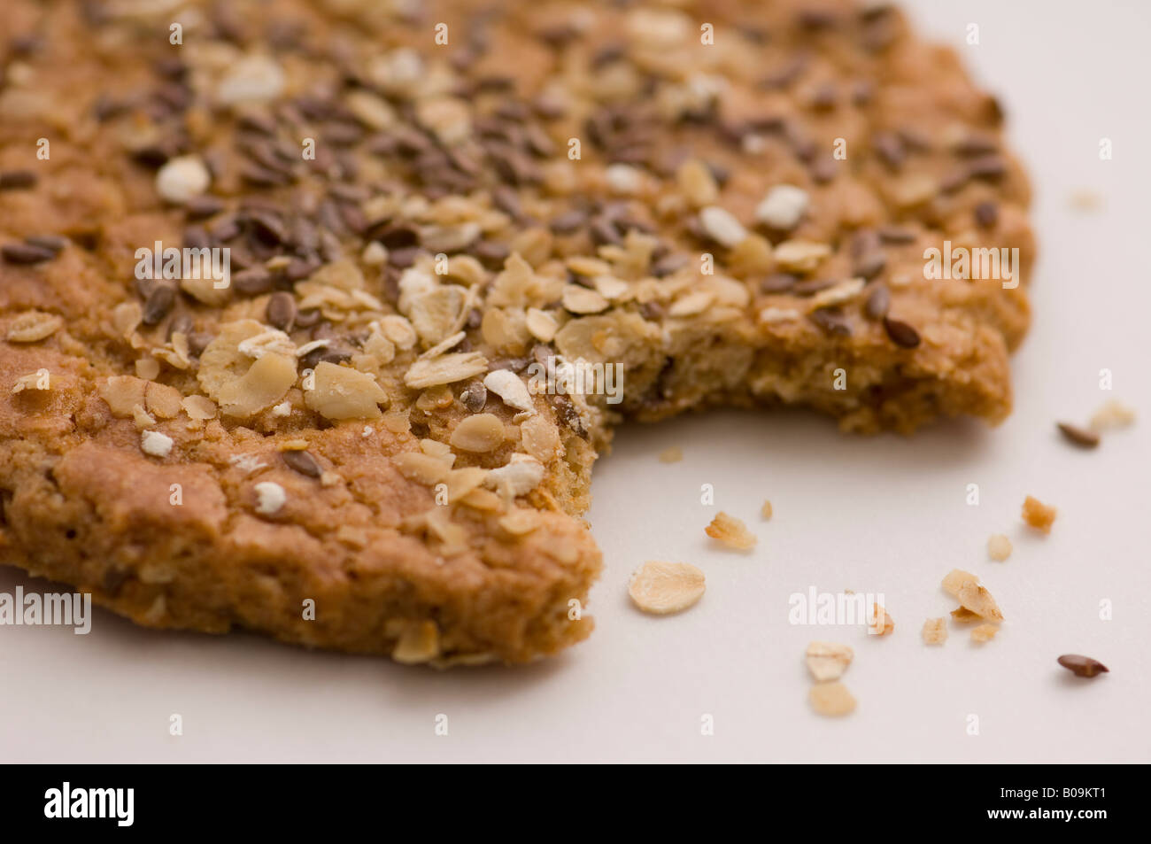 A cookie with a bite taken out of it Stock Photo - Alamy