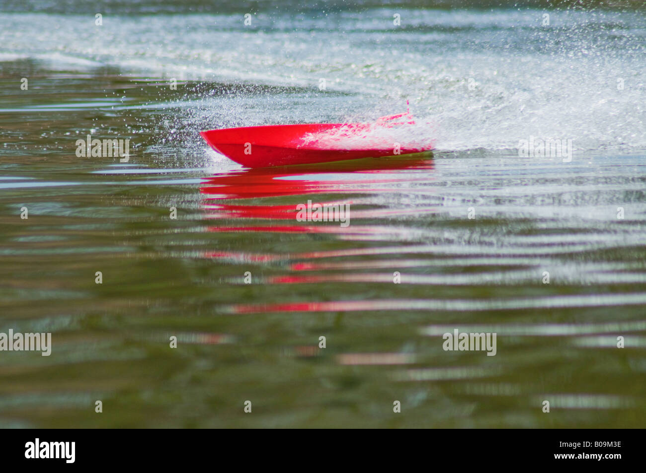 Fast red model power boat (3 Stock Photo - Alamy