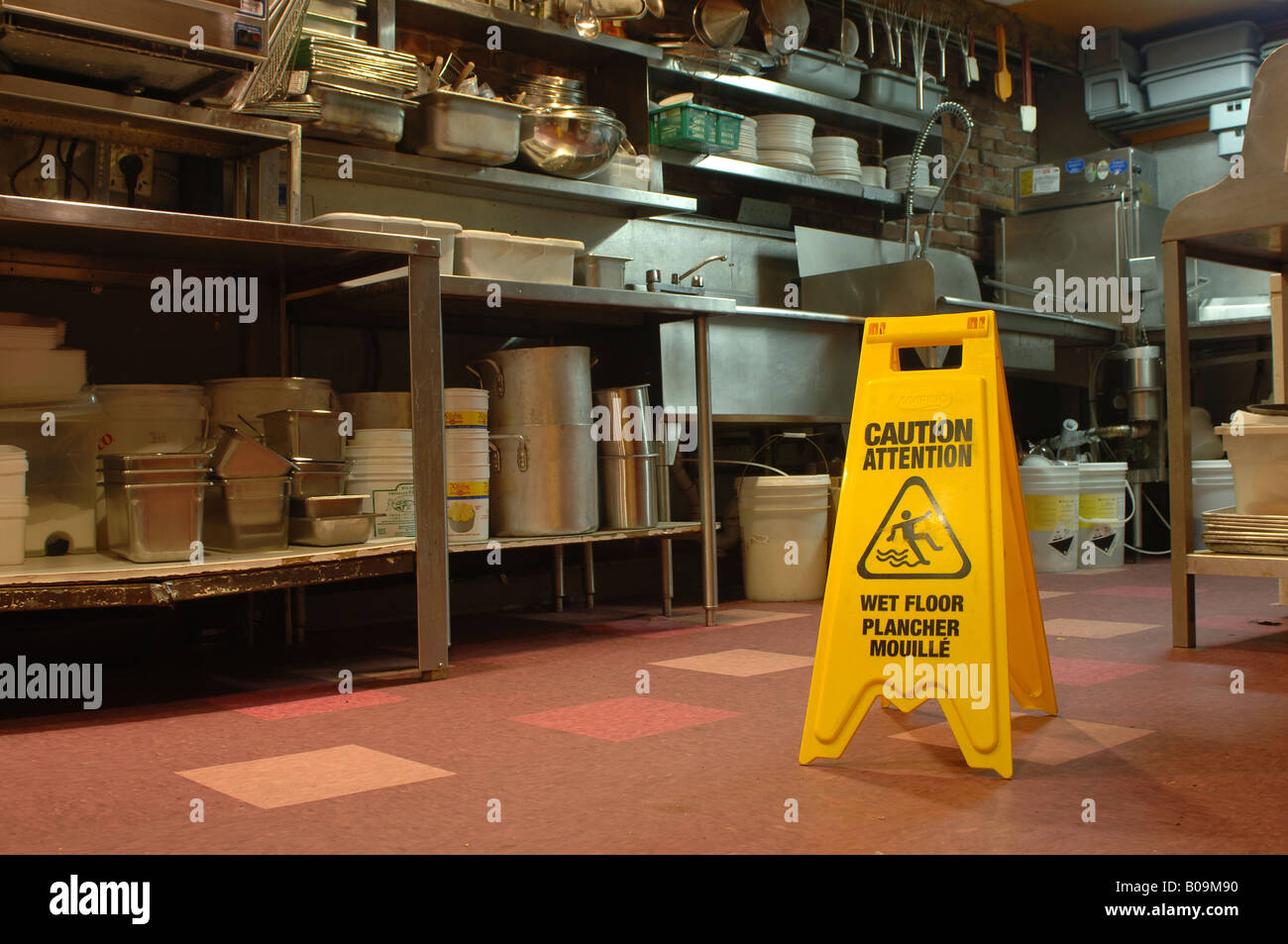 Caution sign in a kitchen Stock Photo - Alamy
