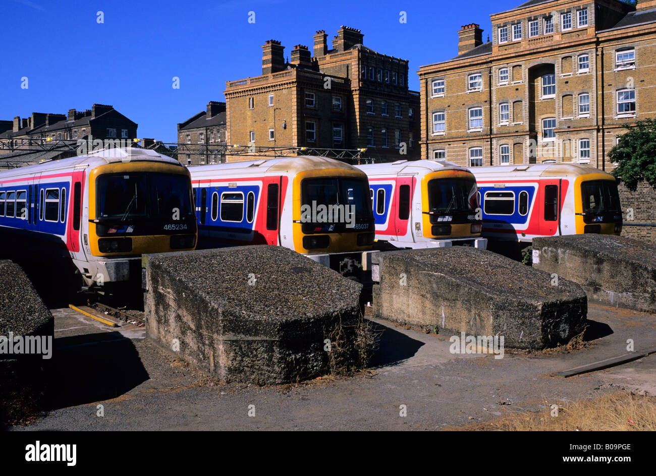 Four trains in sidings near Victoria Station, City of Westminster ...
