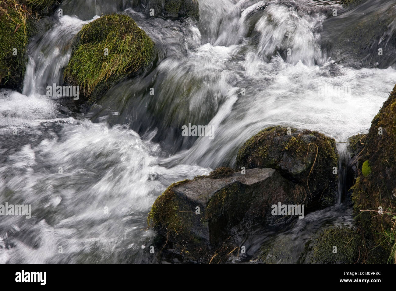 rocks and water cascade waterfall showing movement and flow on the isle ...