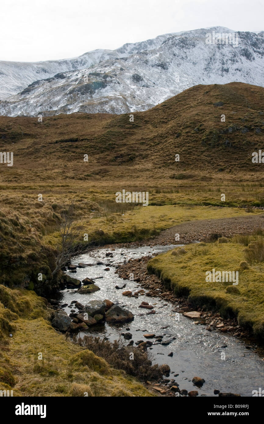 scottish highland landscape five sisters area with mountain stream and ...