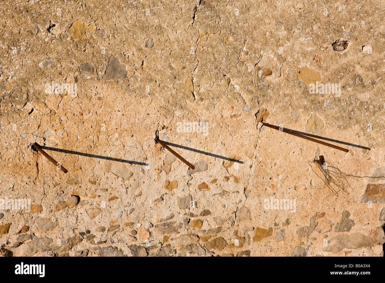 Metal spikes in the wall of a french Stock Photo - Alamy