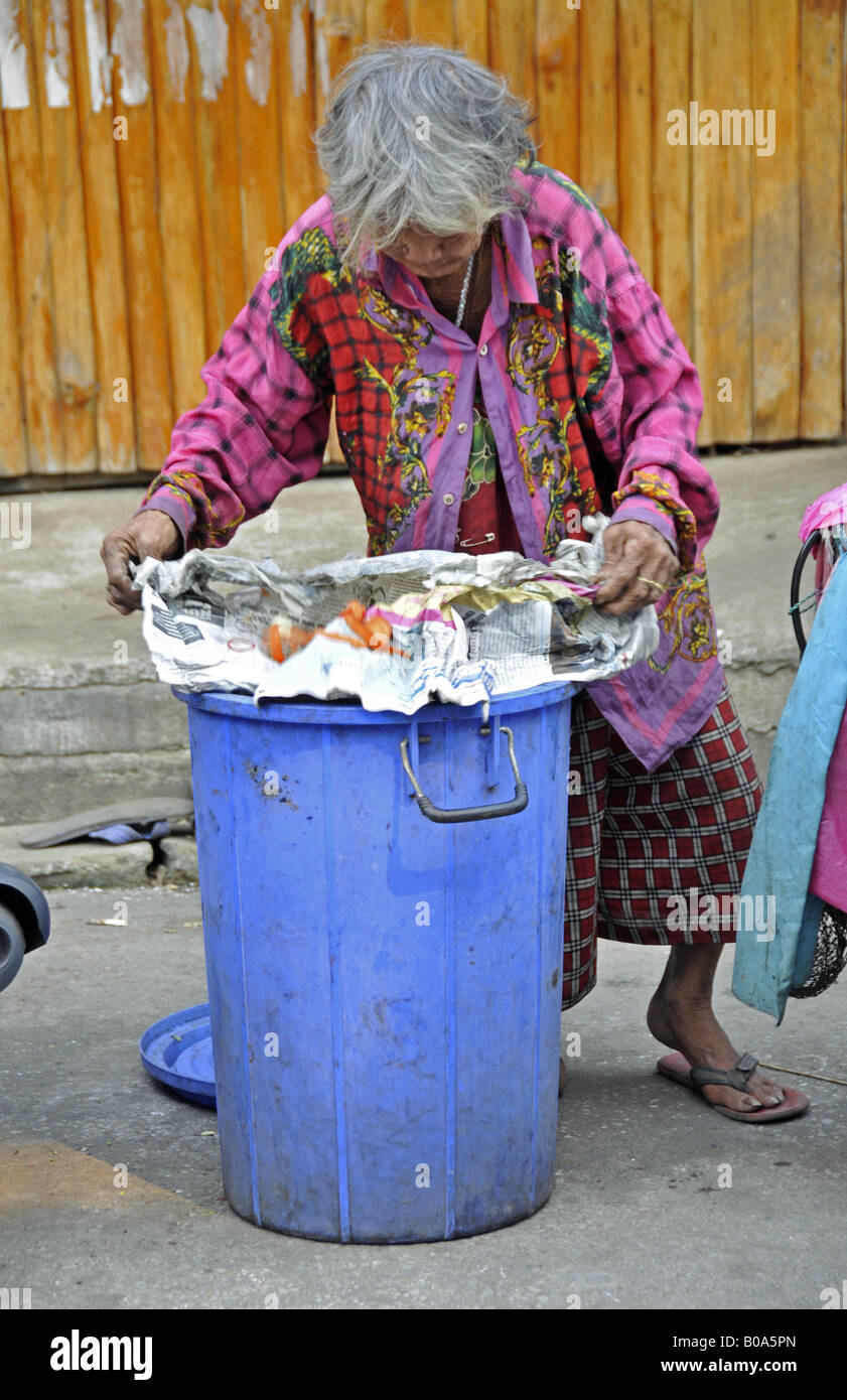 Poor people searching waste hi-res stock photography and images - Alamy