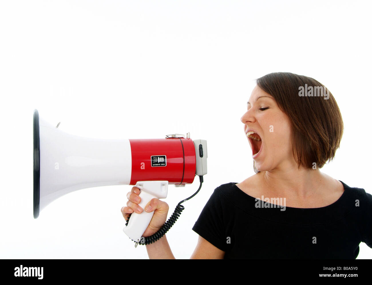 woman screamng into megaphone Stock Photo - Alamy