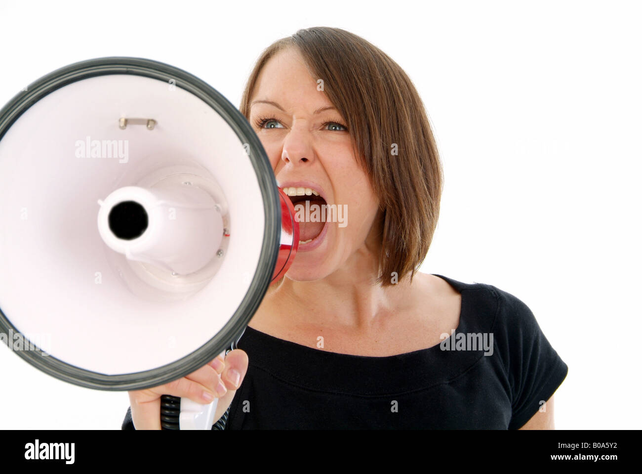 woman screamng into megaphone Stock Photo - Alamy