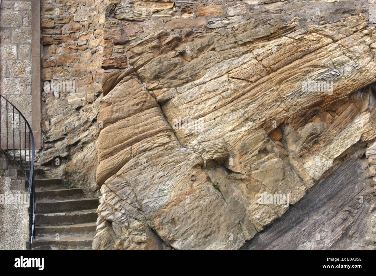 A range of textures in sandstone in the historic fishing village and ...