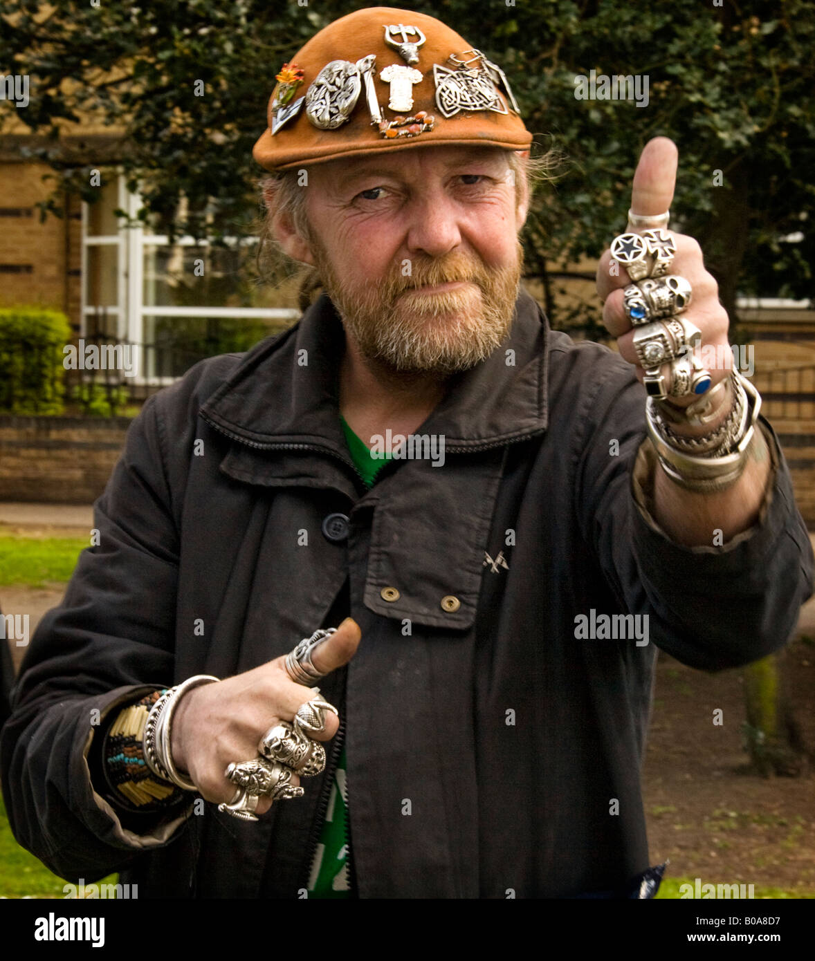 A proud man showing off his collection of silver rings Stock Photo - Alamy
