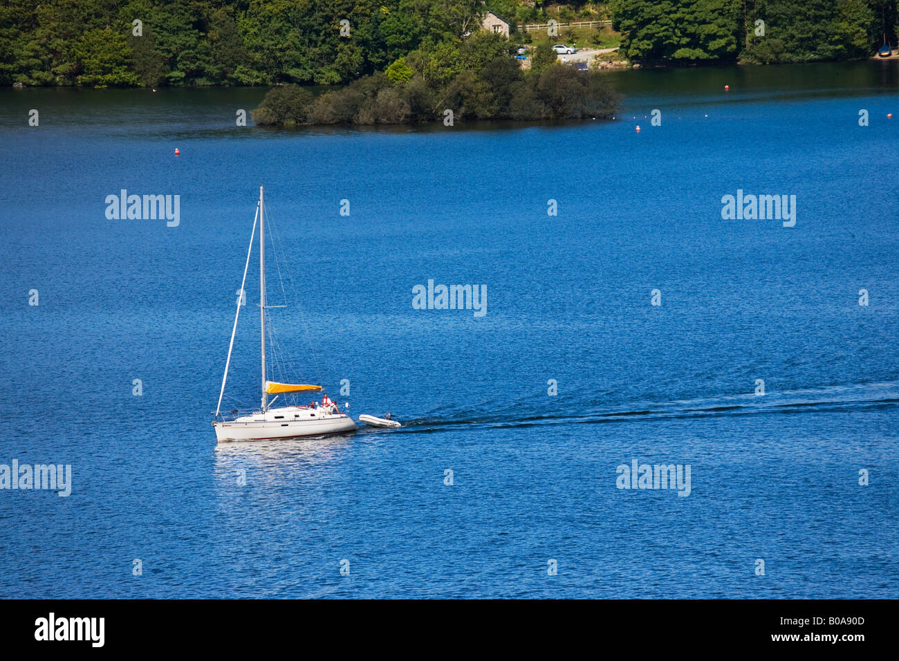 Lake Windermere With A Single White Sail Yacht Crossing Over The Lakes ...