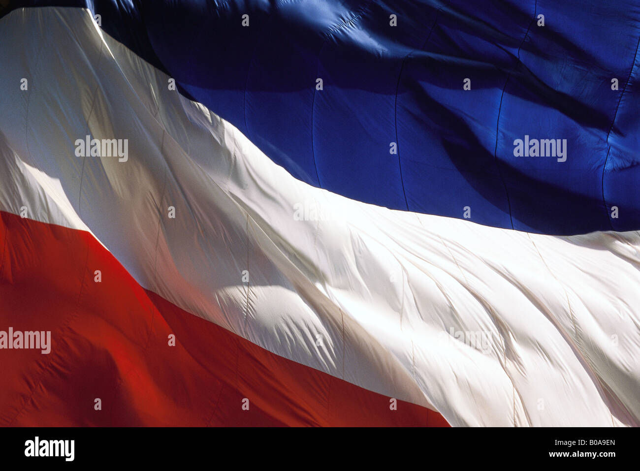 French flag rippling in wind, close-up, full frame Stock Photo - Alamy