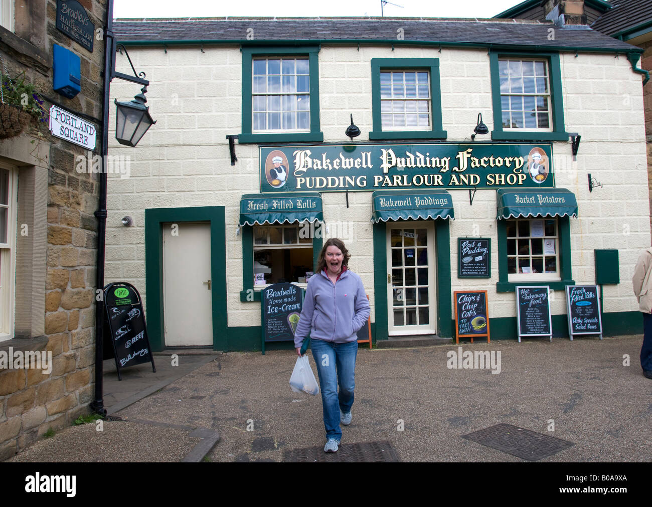 Happy shopper in Bakewell, Derbyshire Stock Photo - Alamy
