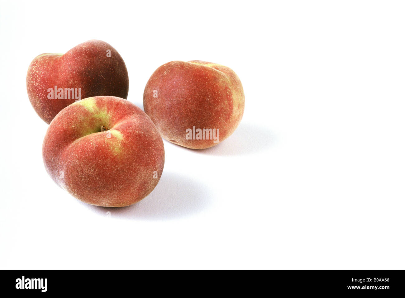 Three peaches, close-up Stock Photo - Alamy