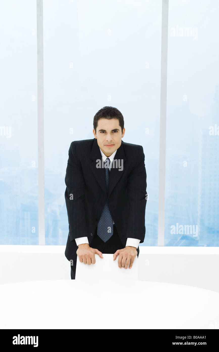 Man standing up from chair hi-res stock photography and images - Alamy