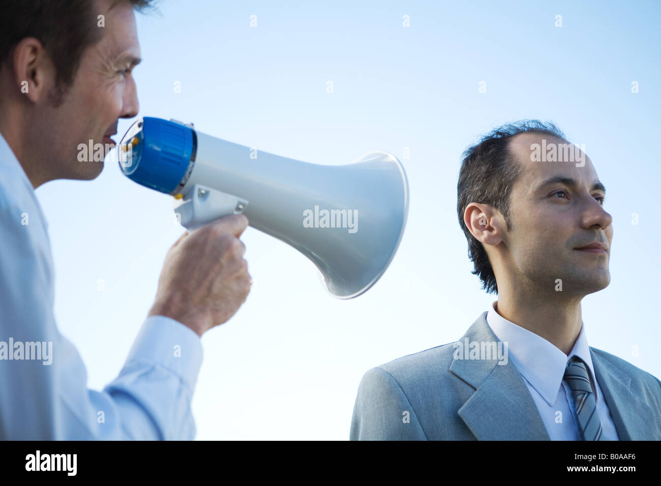 Standing communication holding looking away authority hi-res stock ...