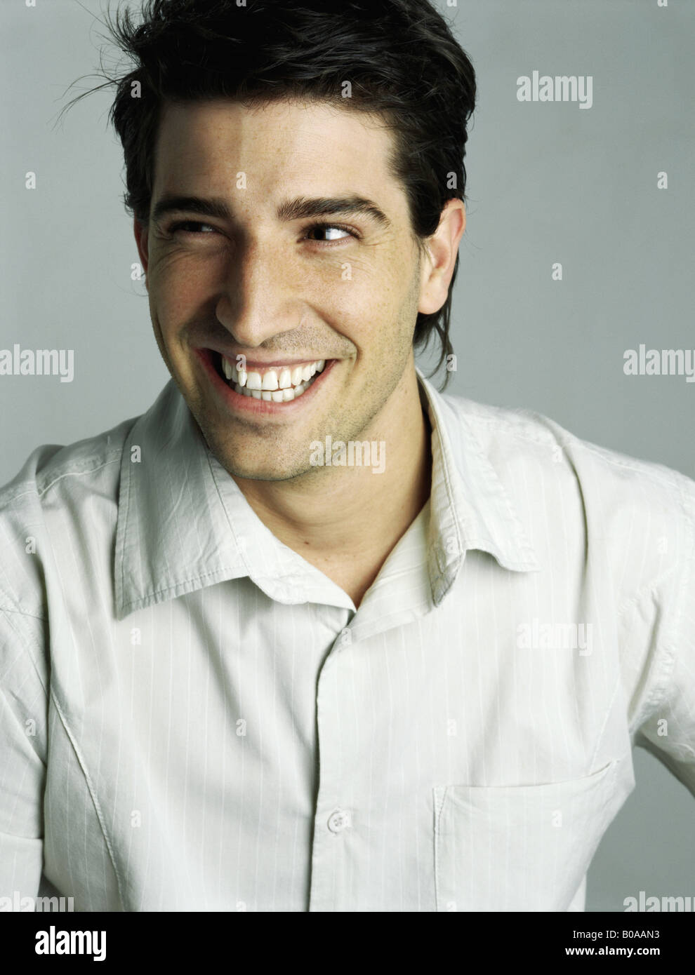 Man looking away, smiling, portrait Stock Photo - Alamy