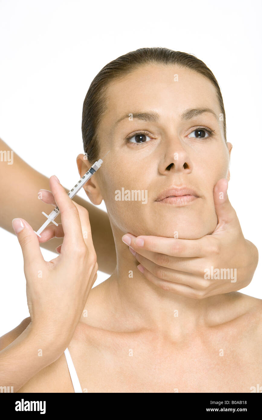 Woman receiving Botox injection Stock Photo - Alamy