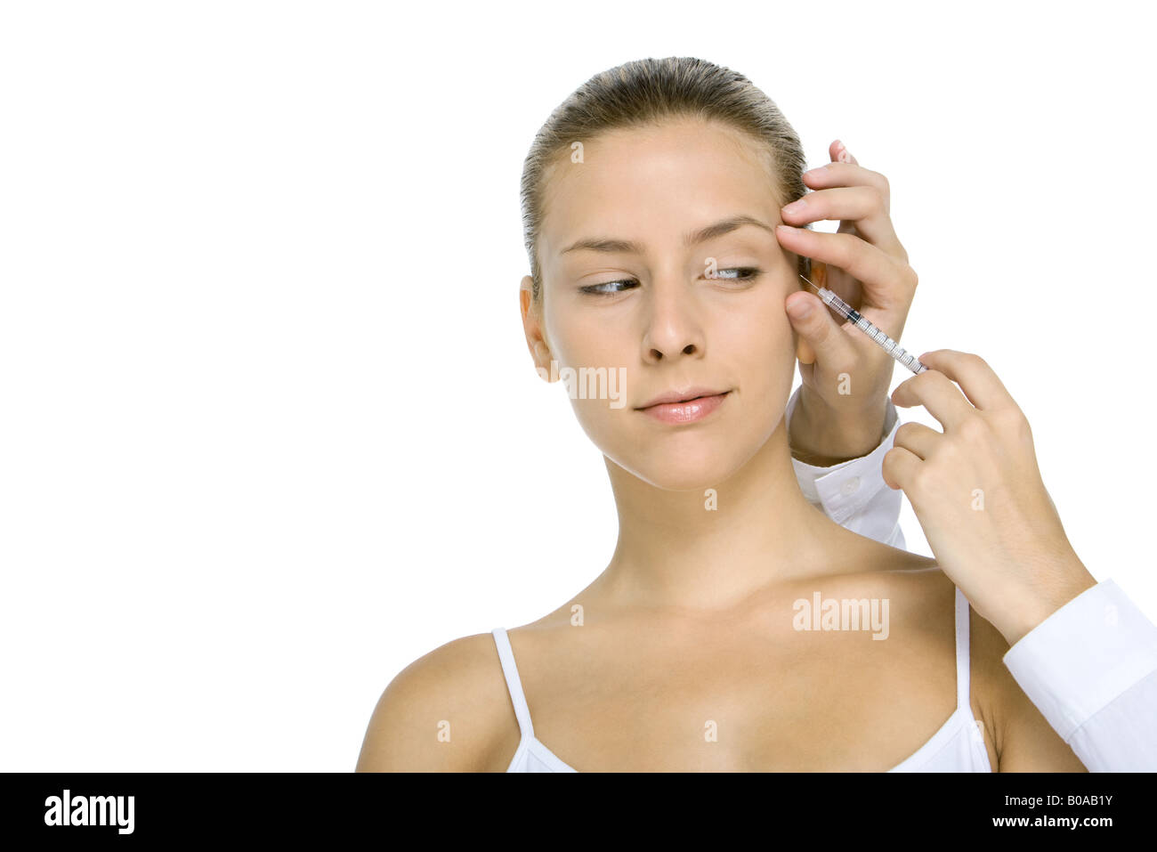 Woman receiving botox injections hi-res stock photography and images ...