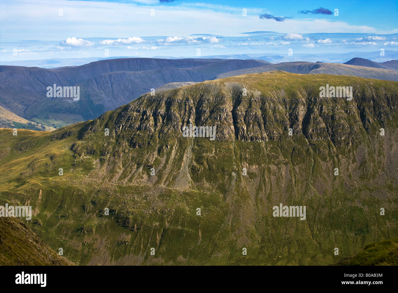 On Helvellyn Summit Looking Out Across To The Imposing Bulk Of 'White ...