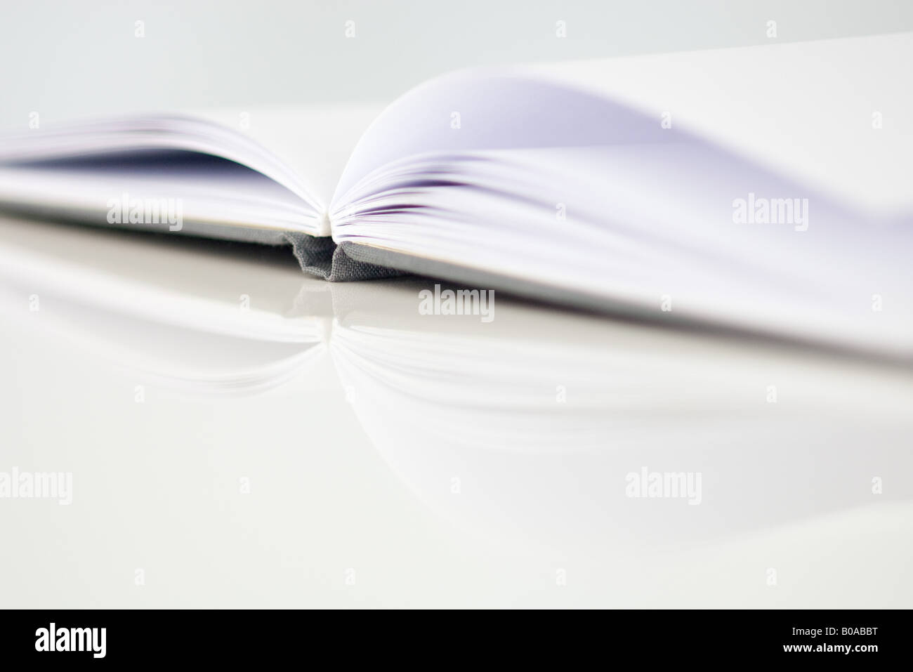 Open book, low angle view Stock Photo - Alamy