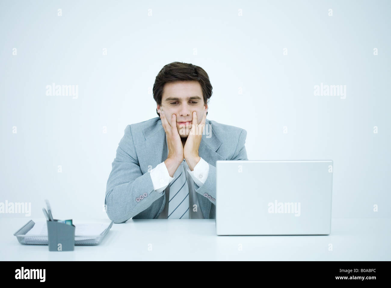 Dejected man looking down hi-res stock photography and images - Alamy