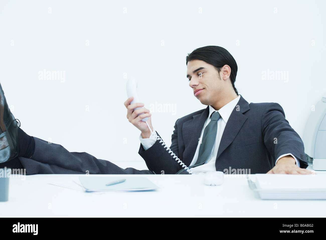 Man telephone office feet desk hi-res stock photography and images - Alamy