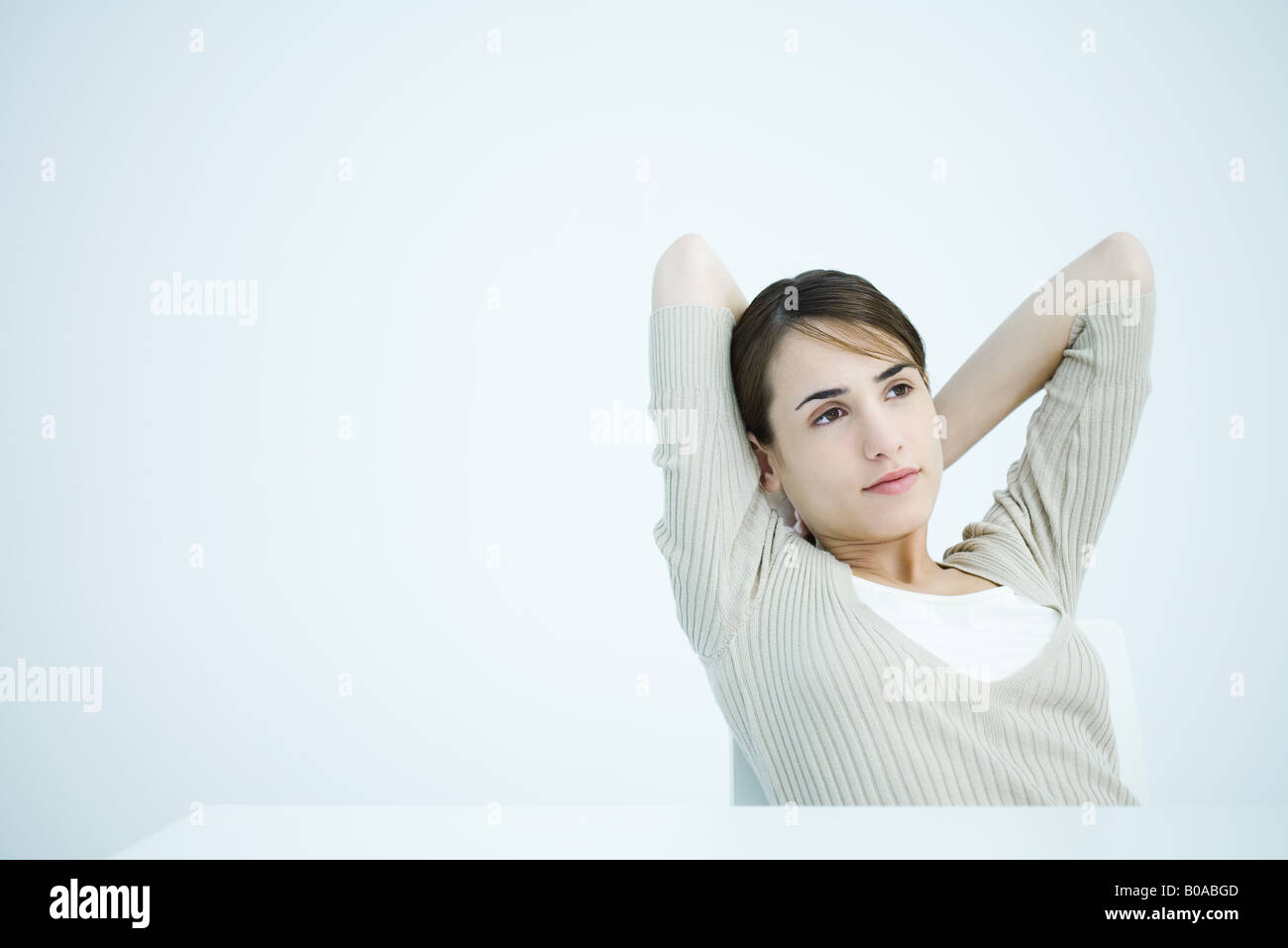 Hands behind heads hi-res stock photography and images - Alamy