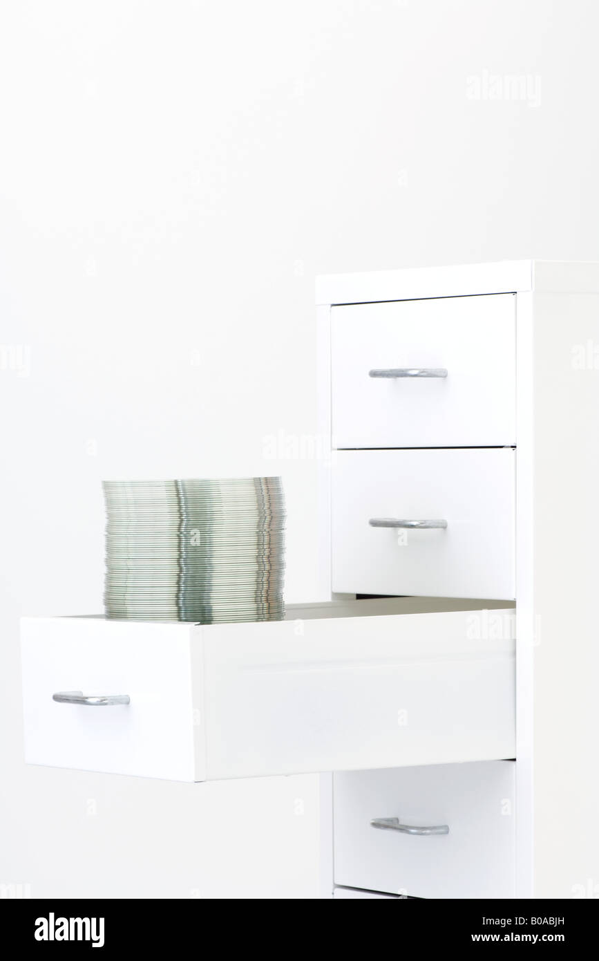 Stack of CDs in filing cabinet drawer Stock Photo - Alamy