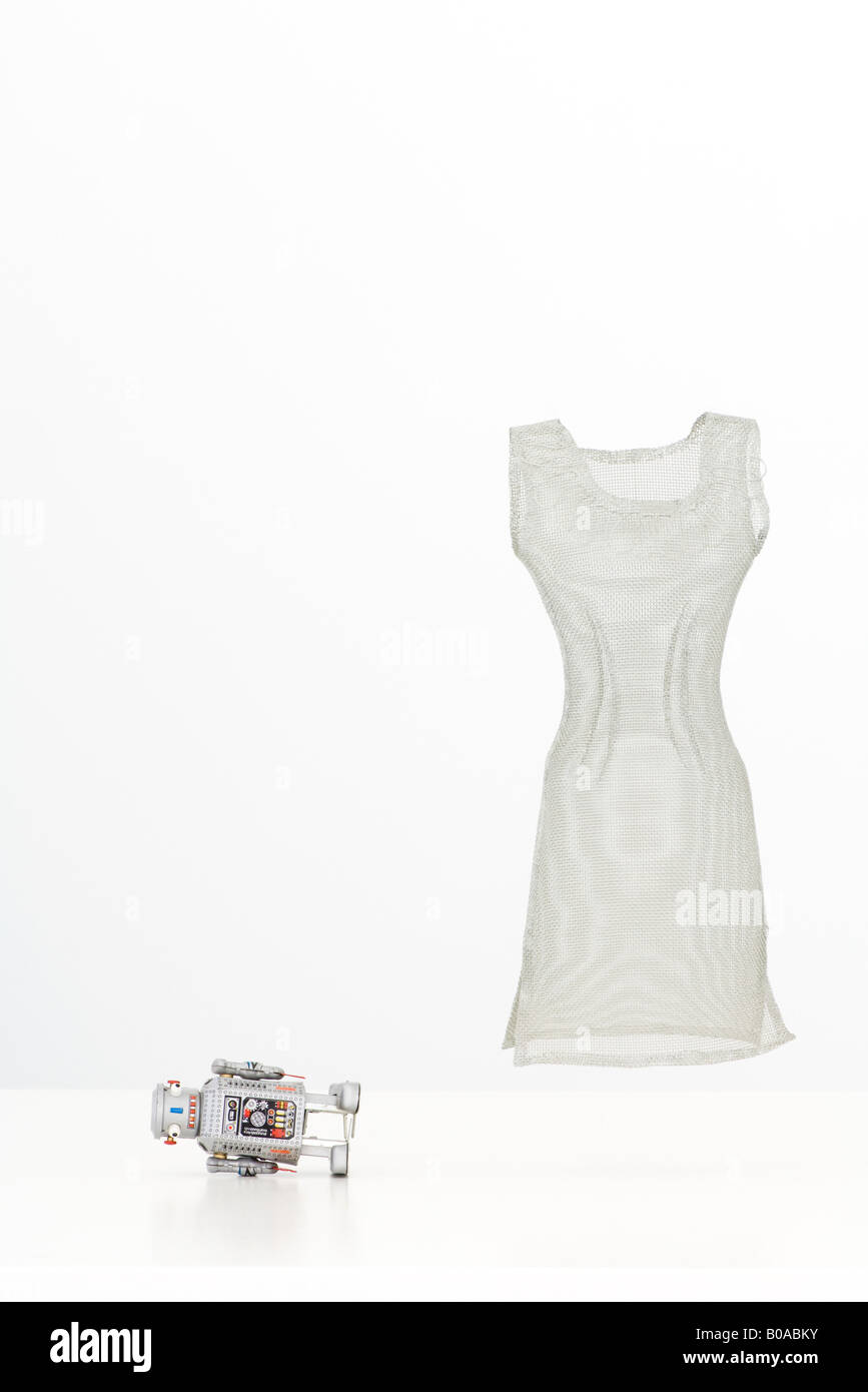 Fallen robot and floating dress Stock Photo - Alamy