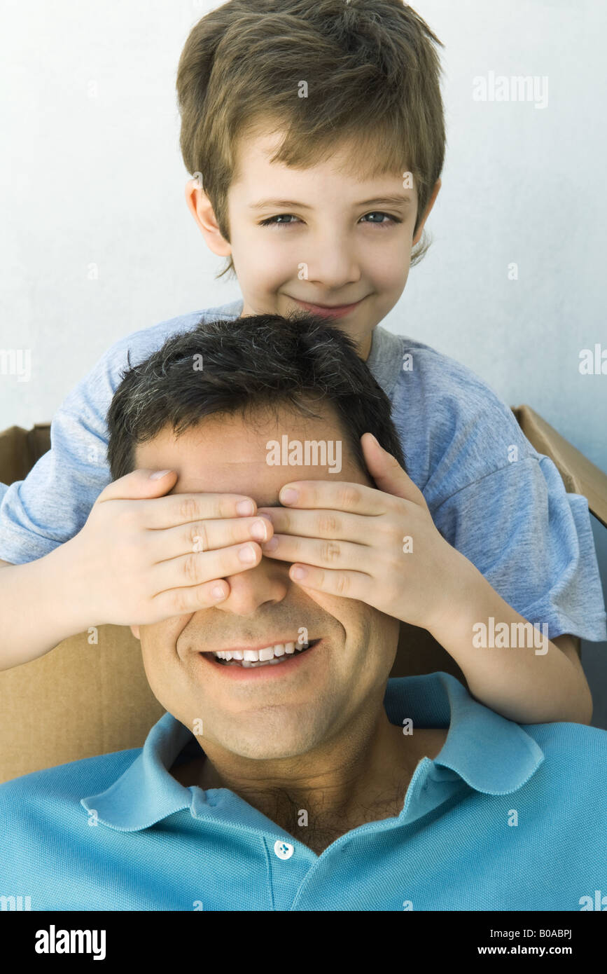 Son Covering Fathers Eyes High Resolution Stock Photography and Images ...