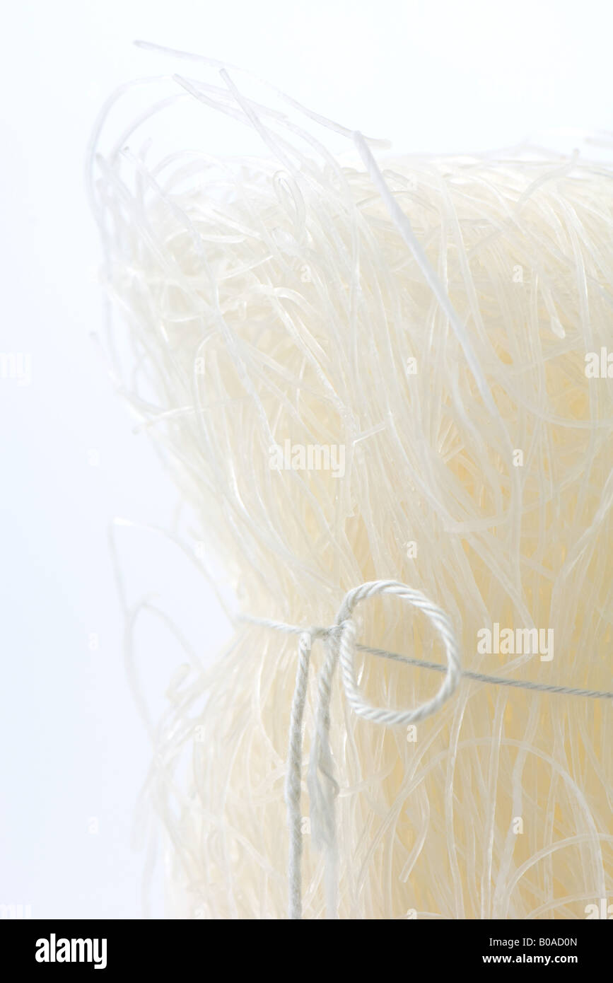 Cellophane noodles tied with string, close-up Stock Photo - Alamy
