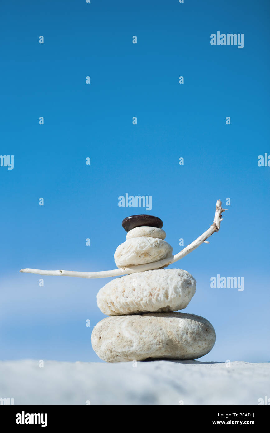 Stacked coral, pebbles, and twig, close-up Stock Photo - Alamy