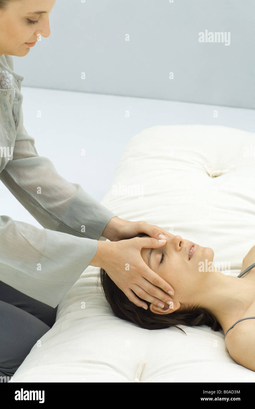 Woman receiving head massage, cropped view Stock Photo - Alamy
