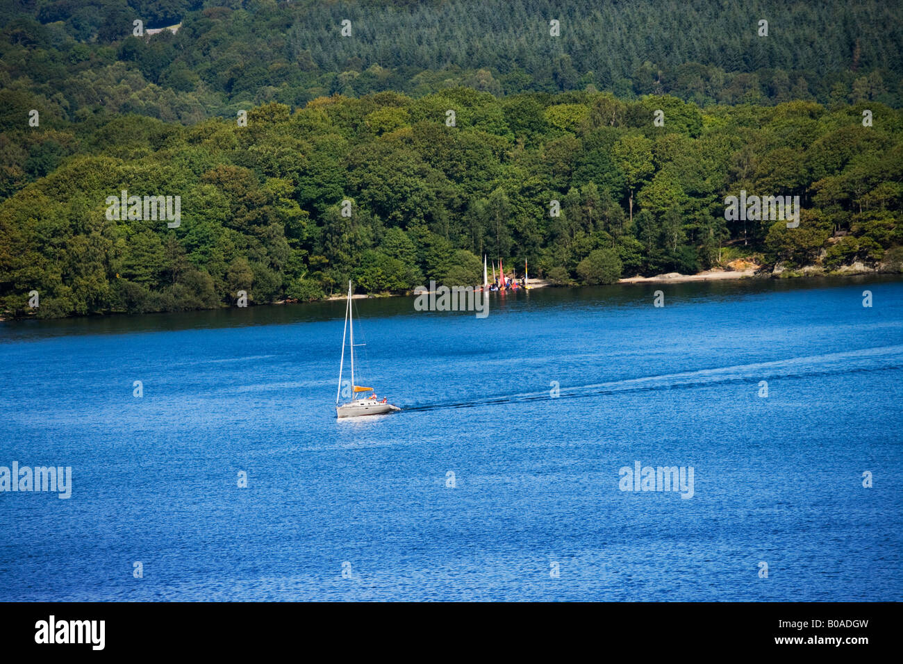 Lake Windermere With A Single White Sail Yacht Crossing Over The Lakes ...