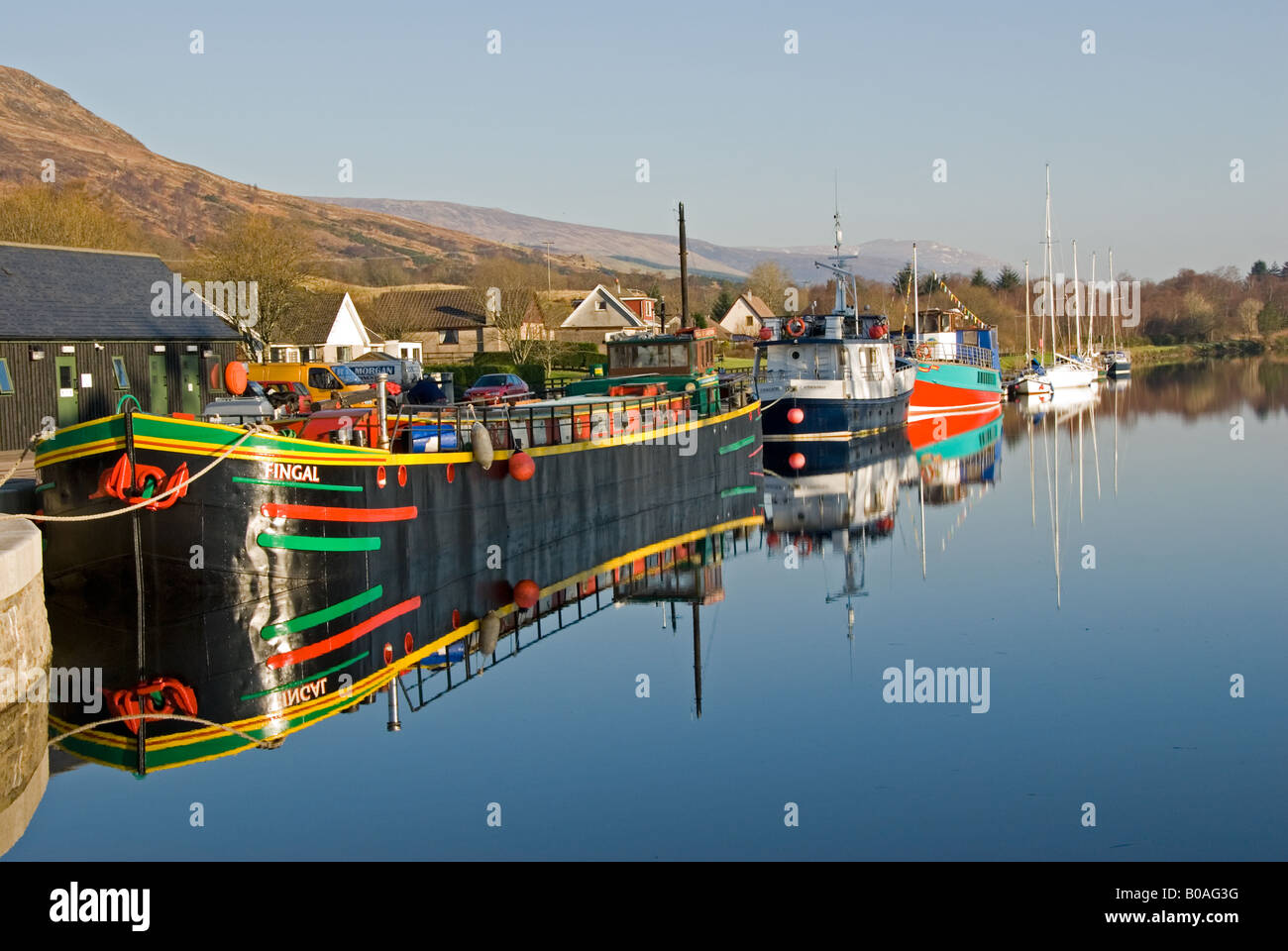 Boats moored in the Caledonian Canal at Banavie Stock Photo - Alamy