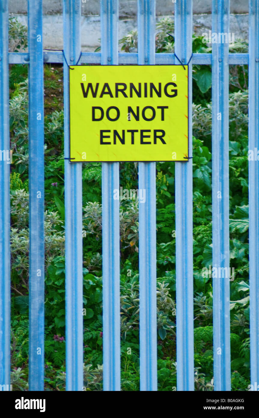Yellow Warning Do Not Enter sign, portrait photograph Stock Photo - Alamy