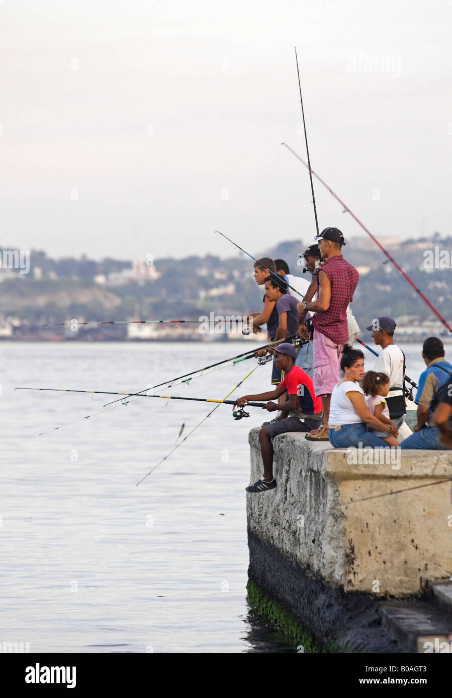 Cubans are fishing in Bahia de la Habana. La Habana Vieja. Old Havana ...