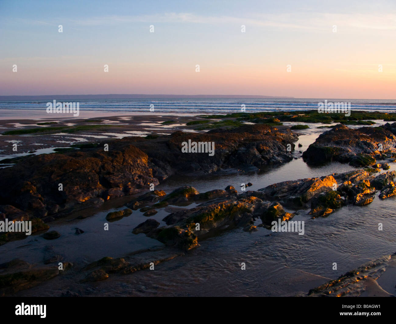 Rocks on Croyd beach North Devon UK at sunset Stock Photo - Alamy