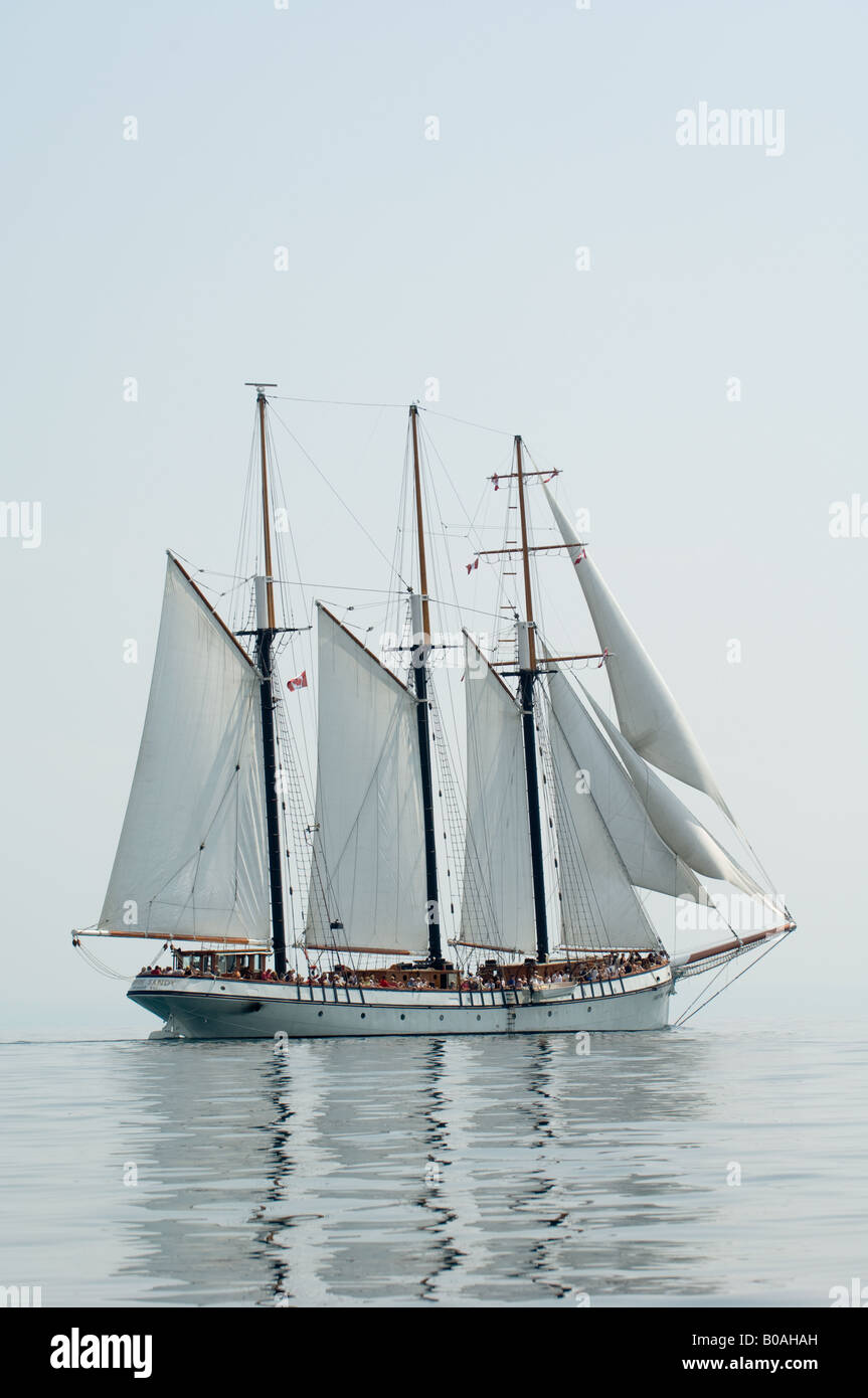 The popular sailing ship "Empire Sandy" takes tourist out for an ...