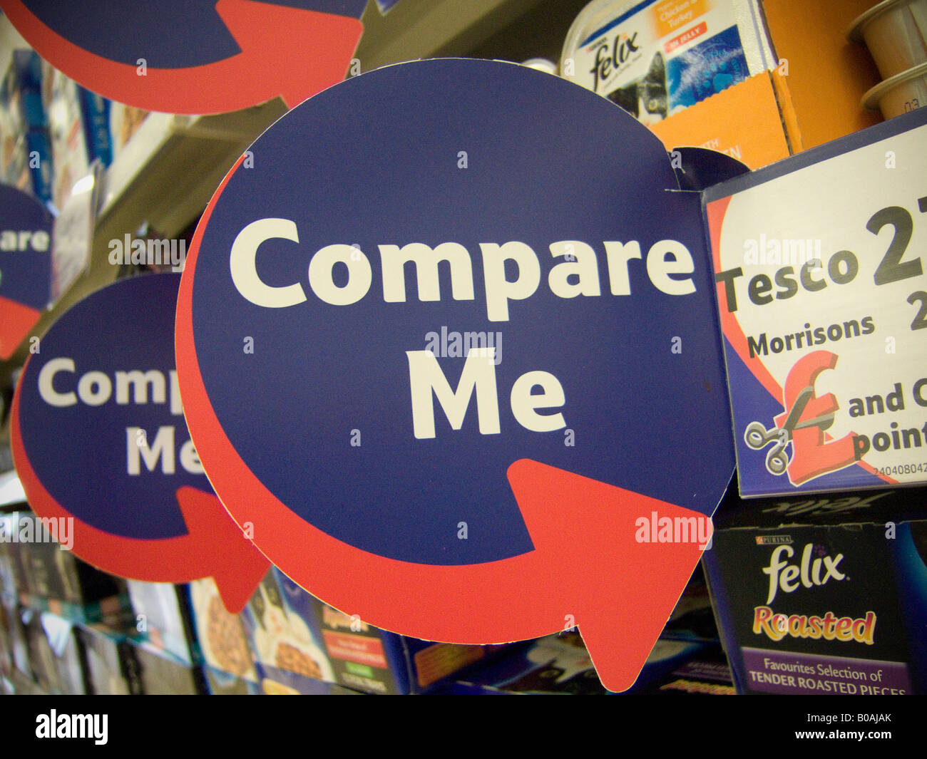 Compare Me sign in a supermarket (Tesco Stock Photo - Alamy