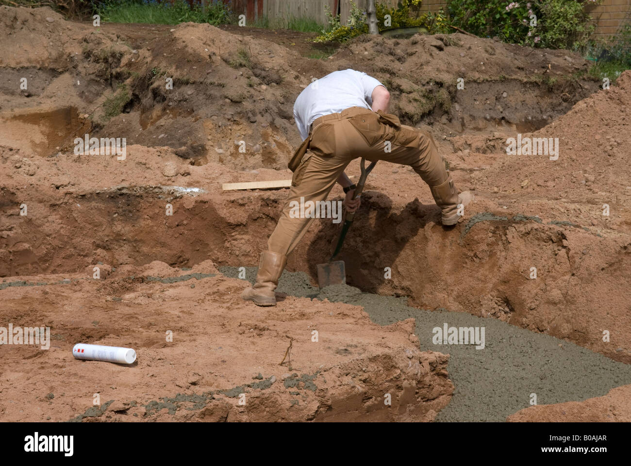 leveling concrete in strip foundation Stock Photo - Alamy