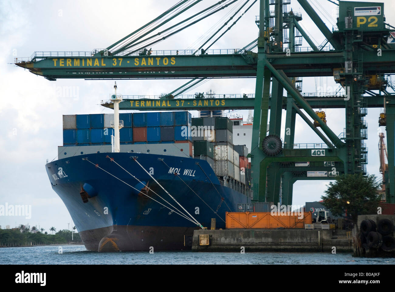 The CMA CGM Jaguar container ship sits docked at the Santos harbor ...
