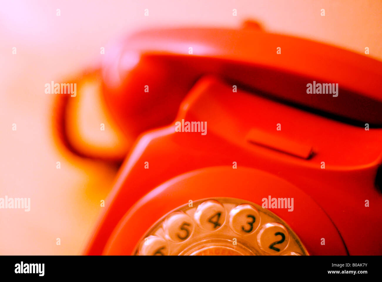Bright red classic GPO 746 telephone, detailed section, creative focus ...