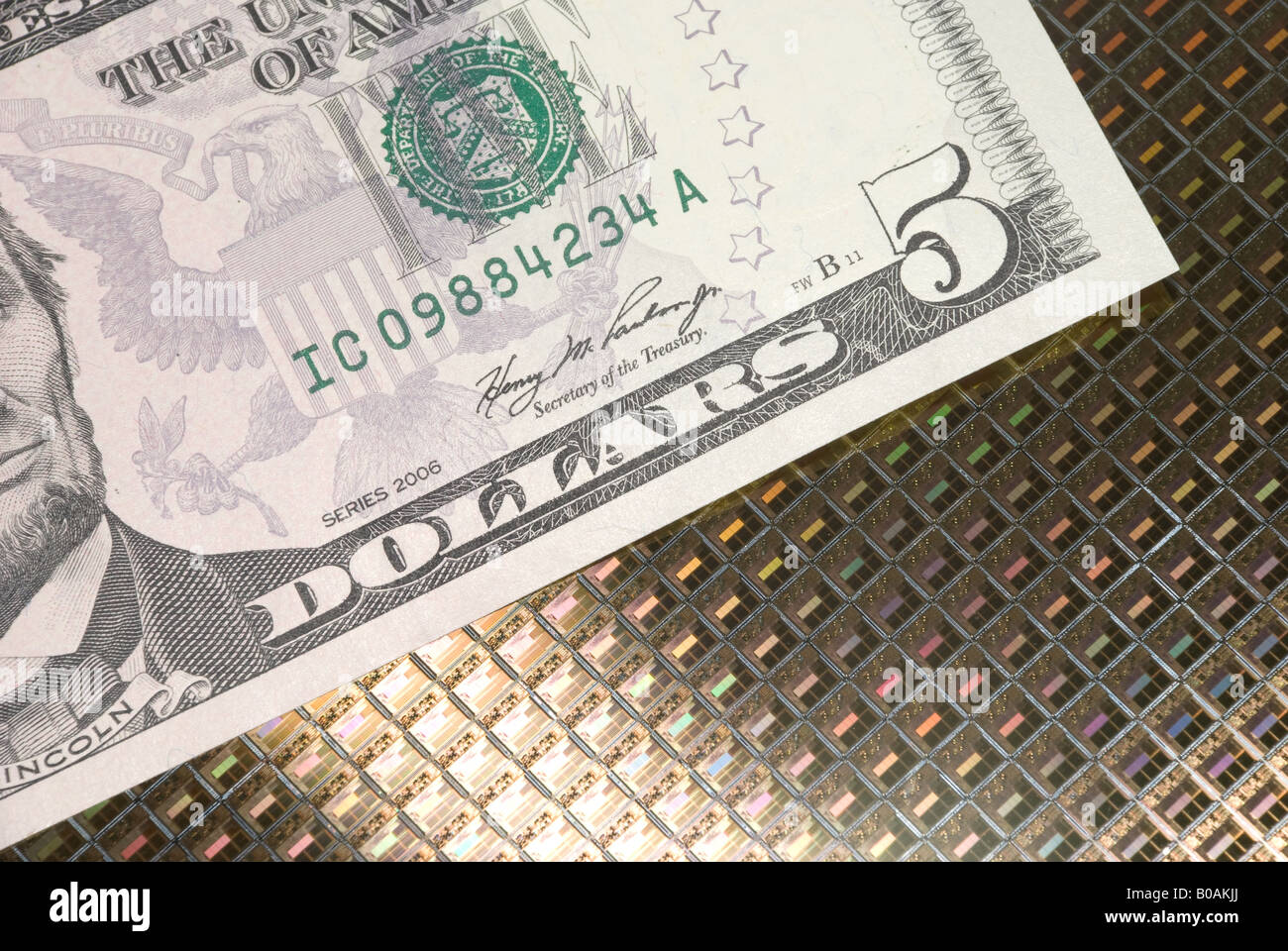 5 Dollars on a silicon wafer Stock Photo - Alamy