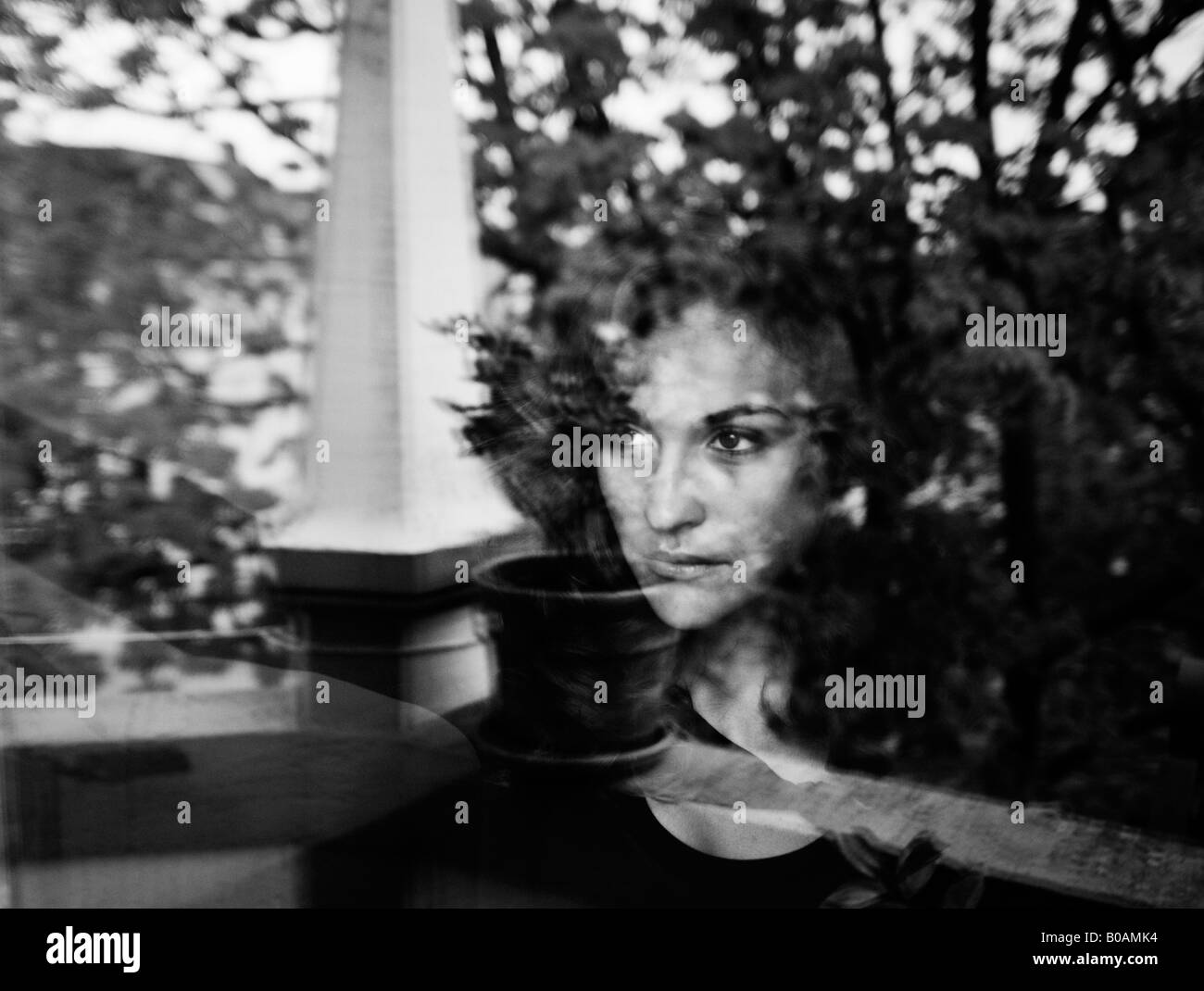 Woman pensive window Black and White Stock Photos & Images - Alamy