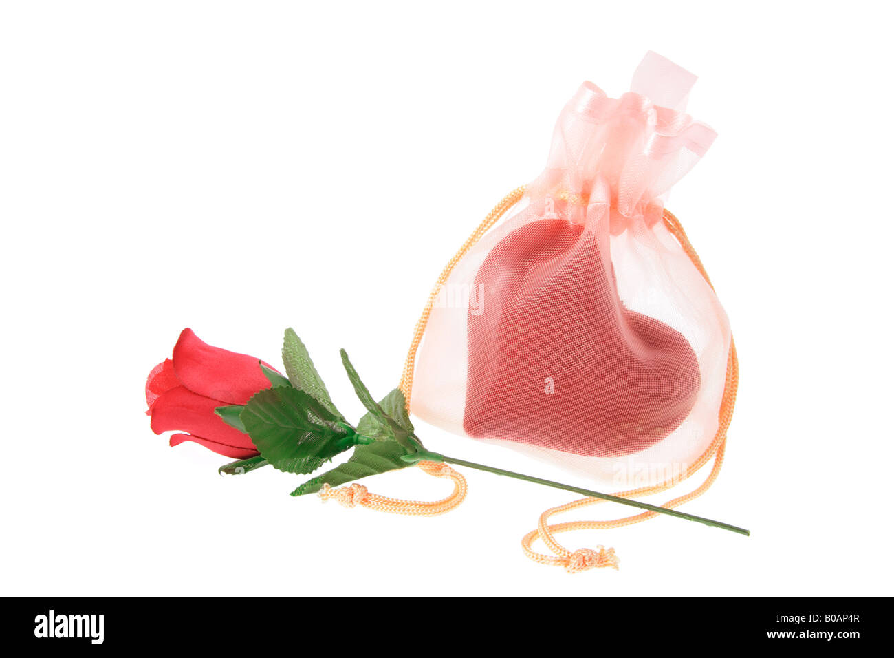 Red Rose and Love Heart in Sachet Stock Photo - Alamy