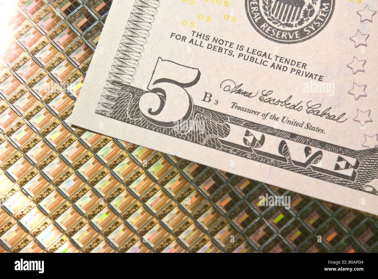 5 Dollars on a silicon wafer Stock Photo - Alamy