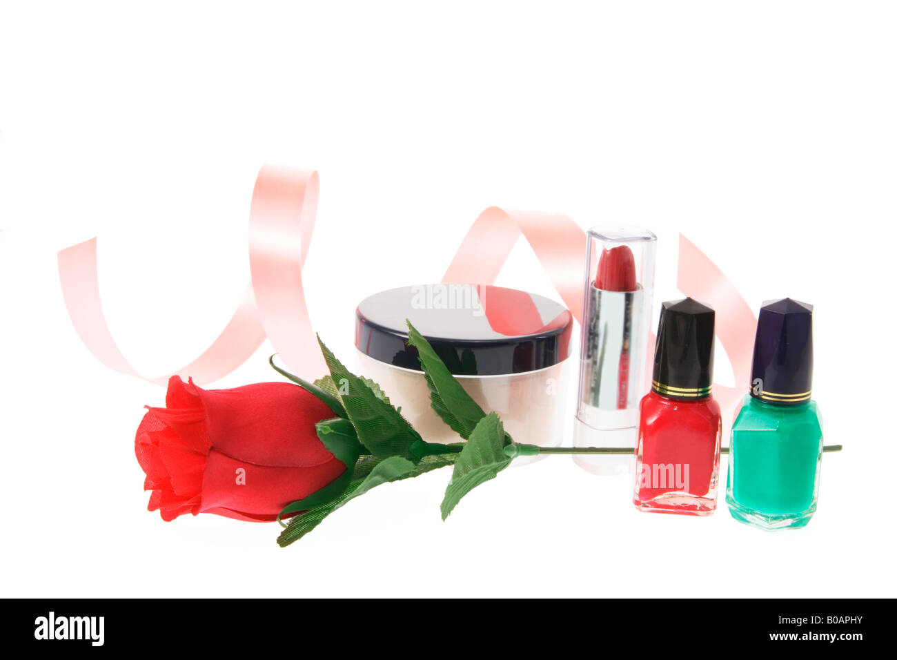 Cosmetics and Red Rose Stock Photo - Alamy